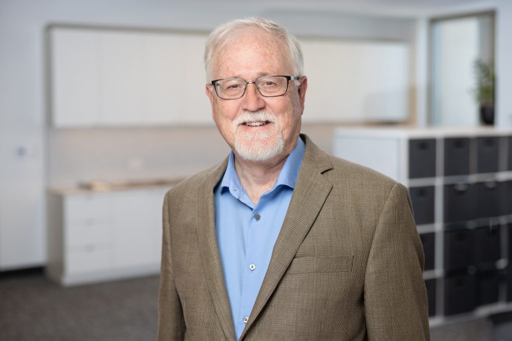Premier Names Sims Director of Architecture – Mann Report
